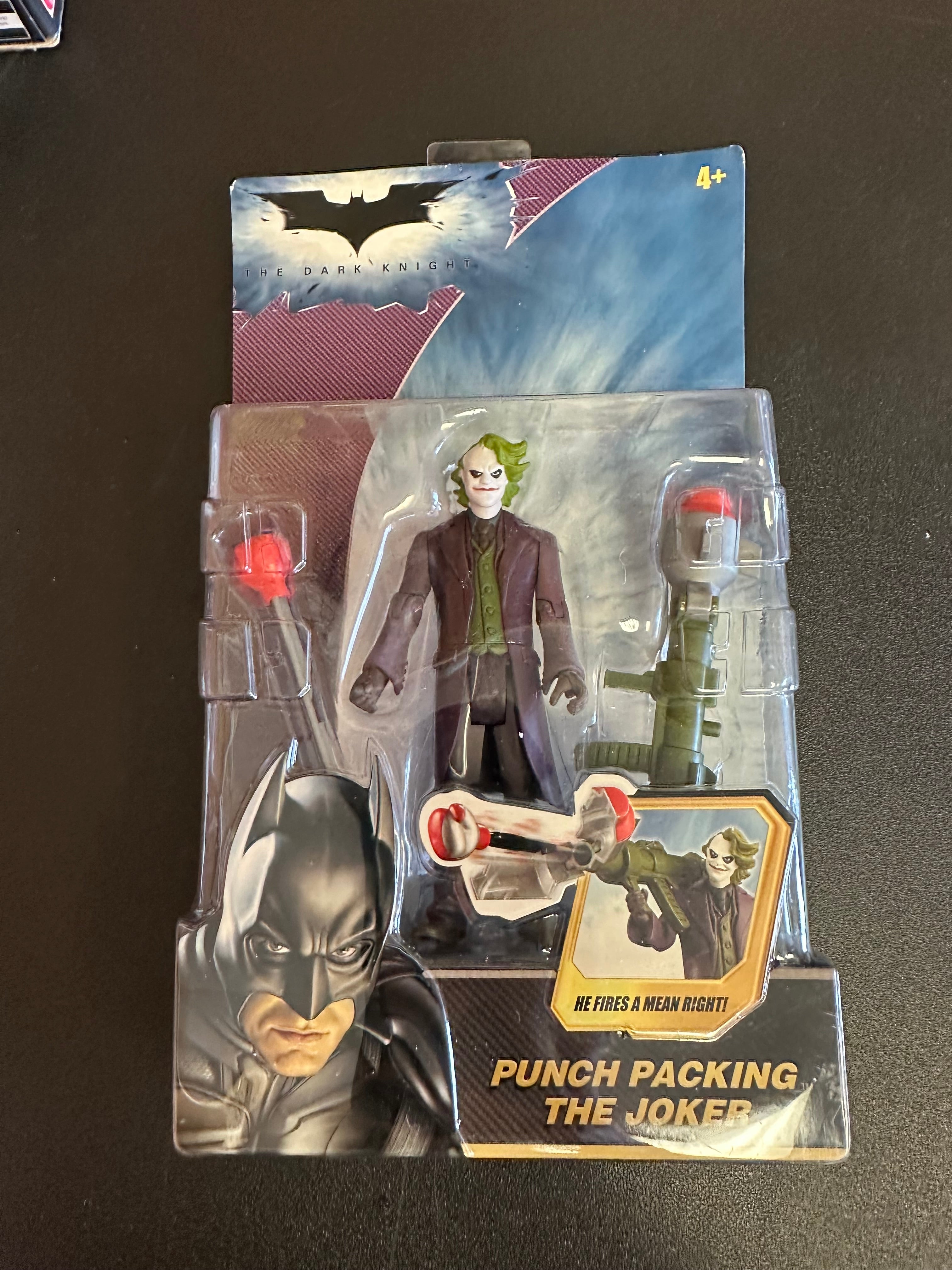 Mattel The Dark Knight Batman Punch Packing Joker – Hitchhiker Toys